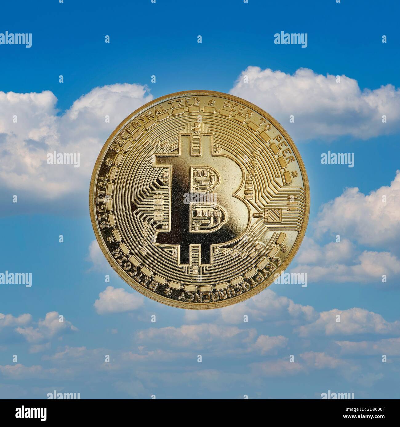 Bitcoin on sky background Stock Photo - Alamy