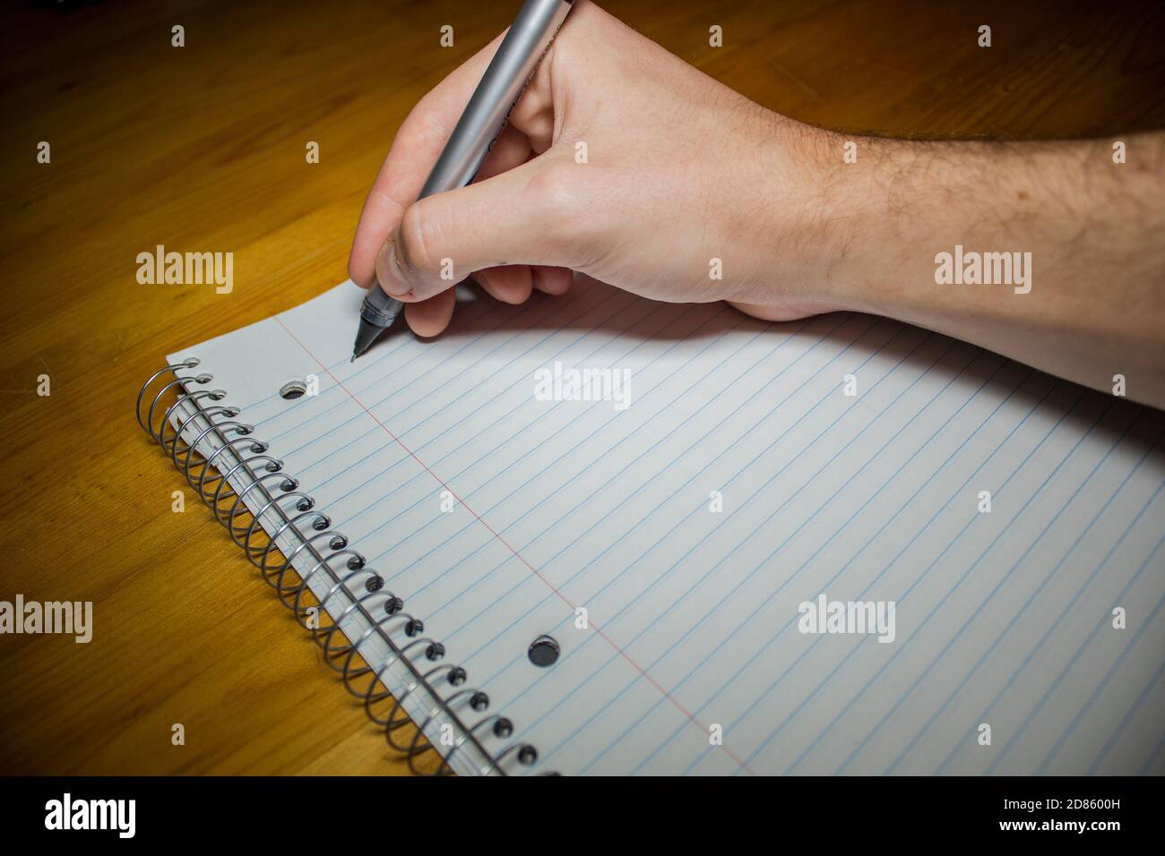 Notepad writing hand wood hi-res stock photography and images - Alamy