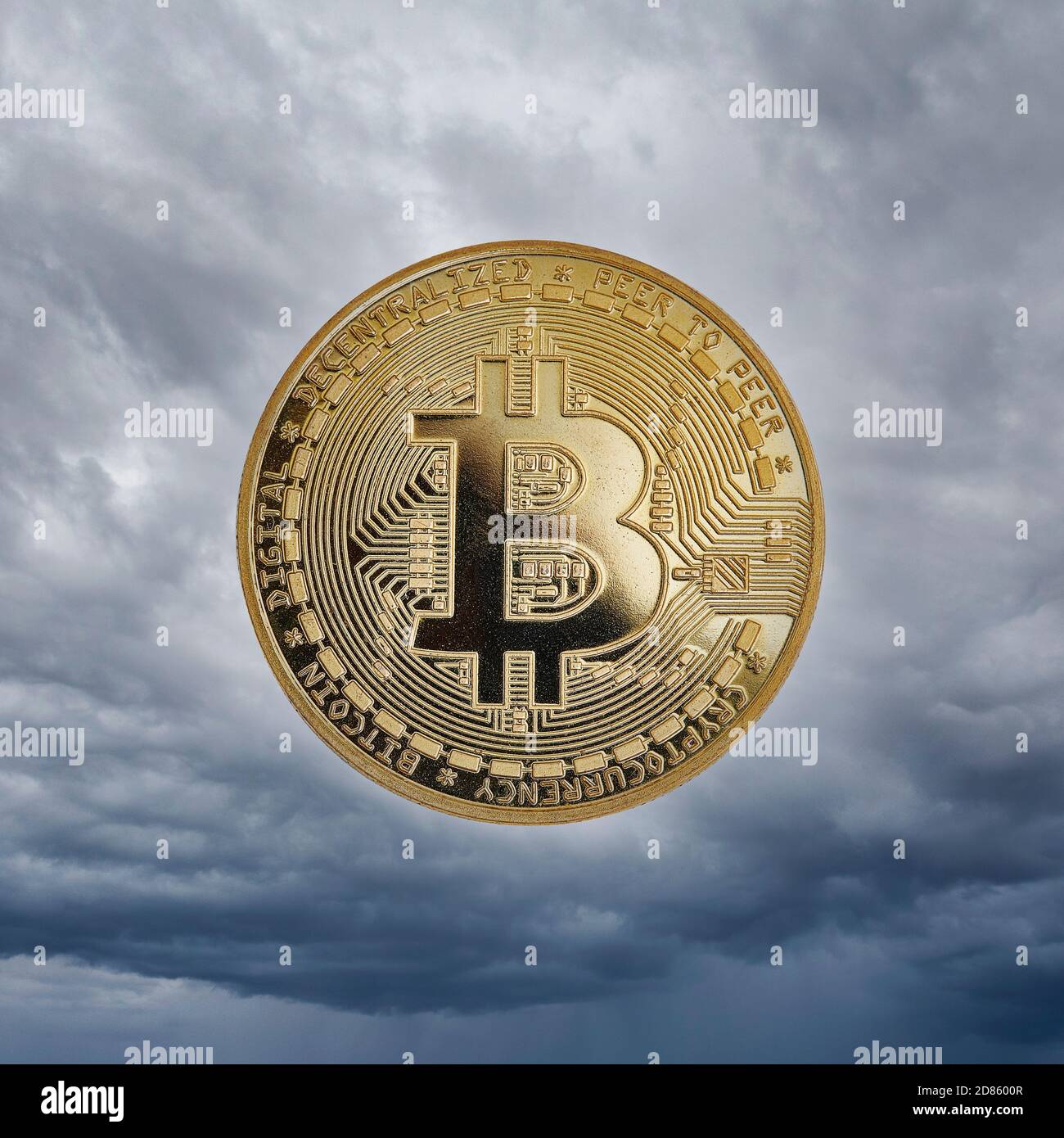 Bitcoin on sky background Stock Photo - Alamy