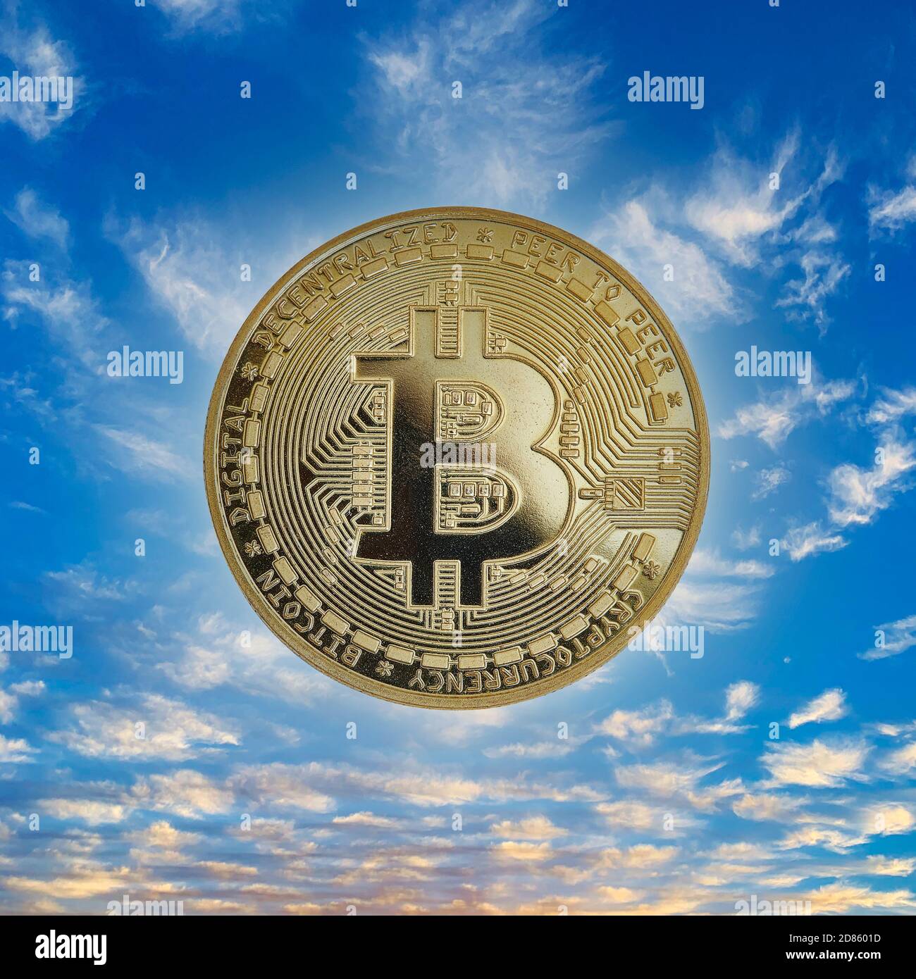 Bitcoin on sky background Stock Photo - Alamy