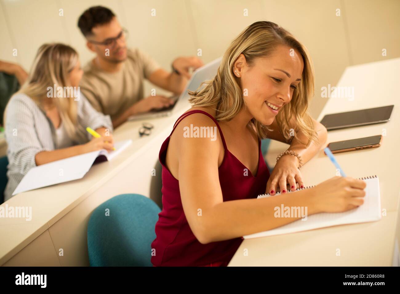 Group of university students in the classroom Stock Photo - Alamy