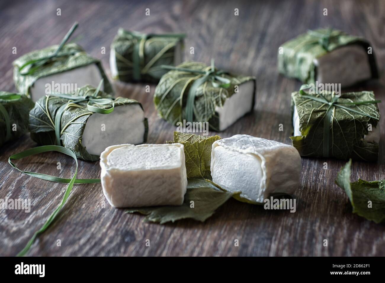 Craft cheese from cows and goats milk. Cheese head Stock Photo - Alamy