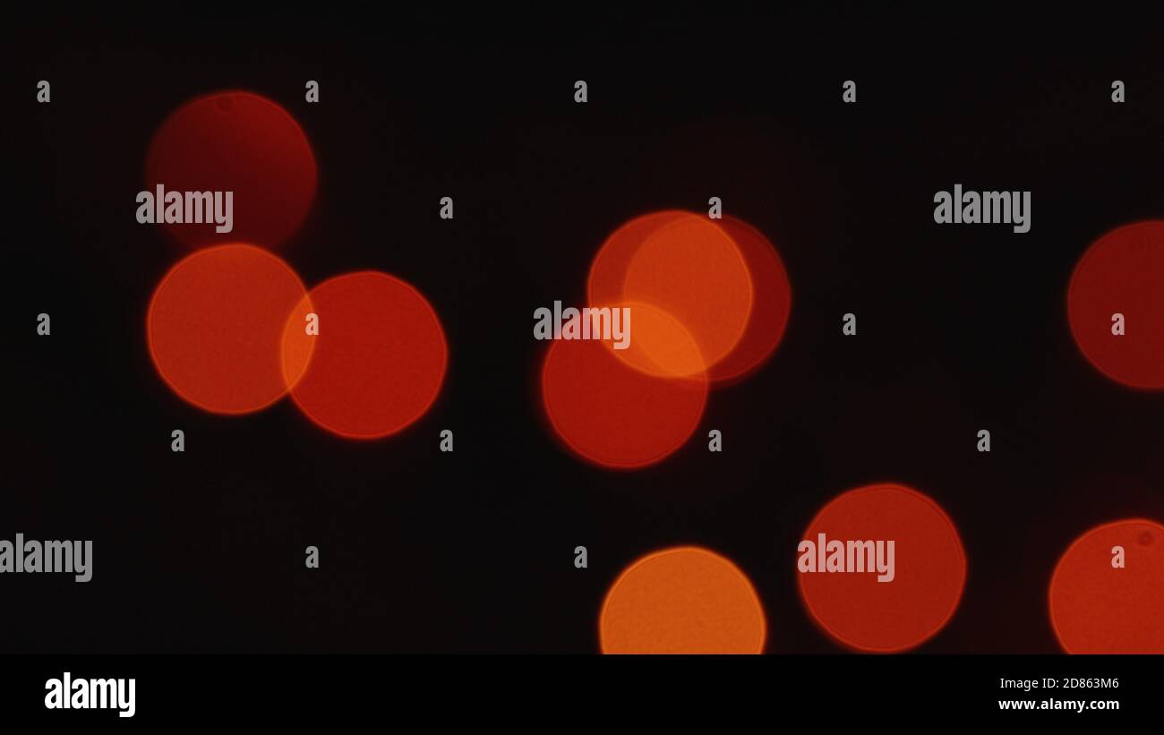 blurred dull Christmas lights light up slowly and fade out deep bokeh ...