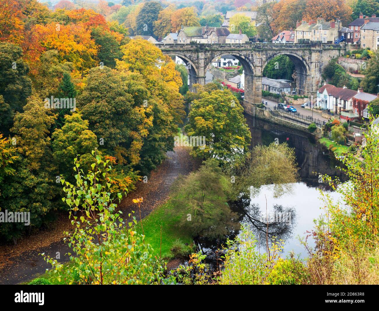 Historic railway viaduct over the River Nidd in autumn at Knaresborough ...