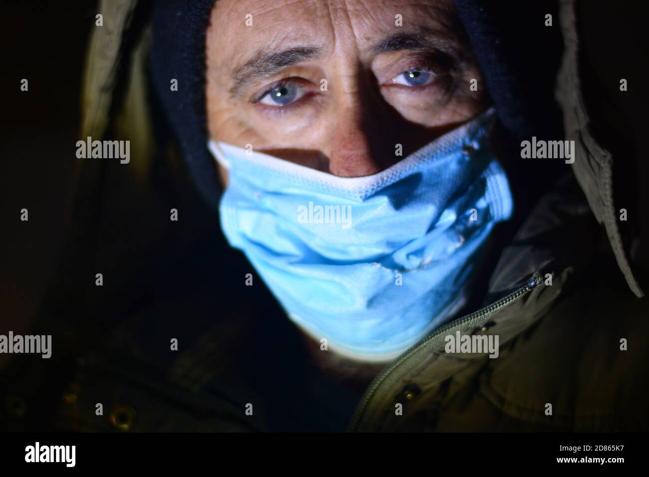 the face covered by the mask Stock Photo - Alamy