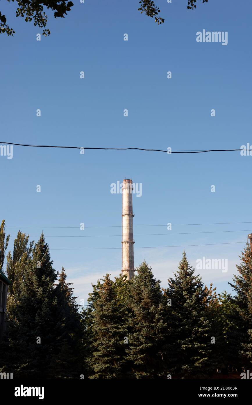 smoke-free plant chimney in tree frame tall industrial chimney stacks ...
