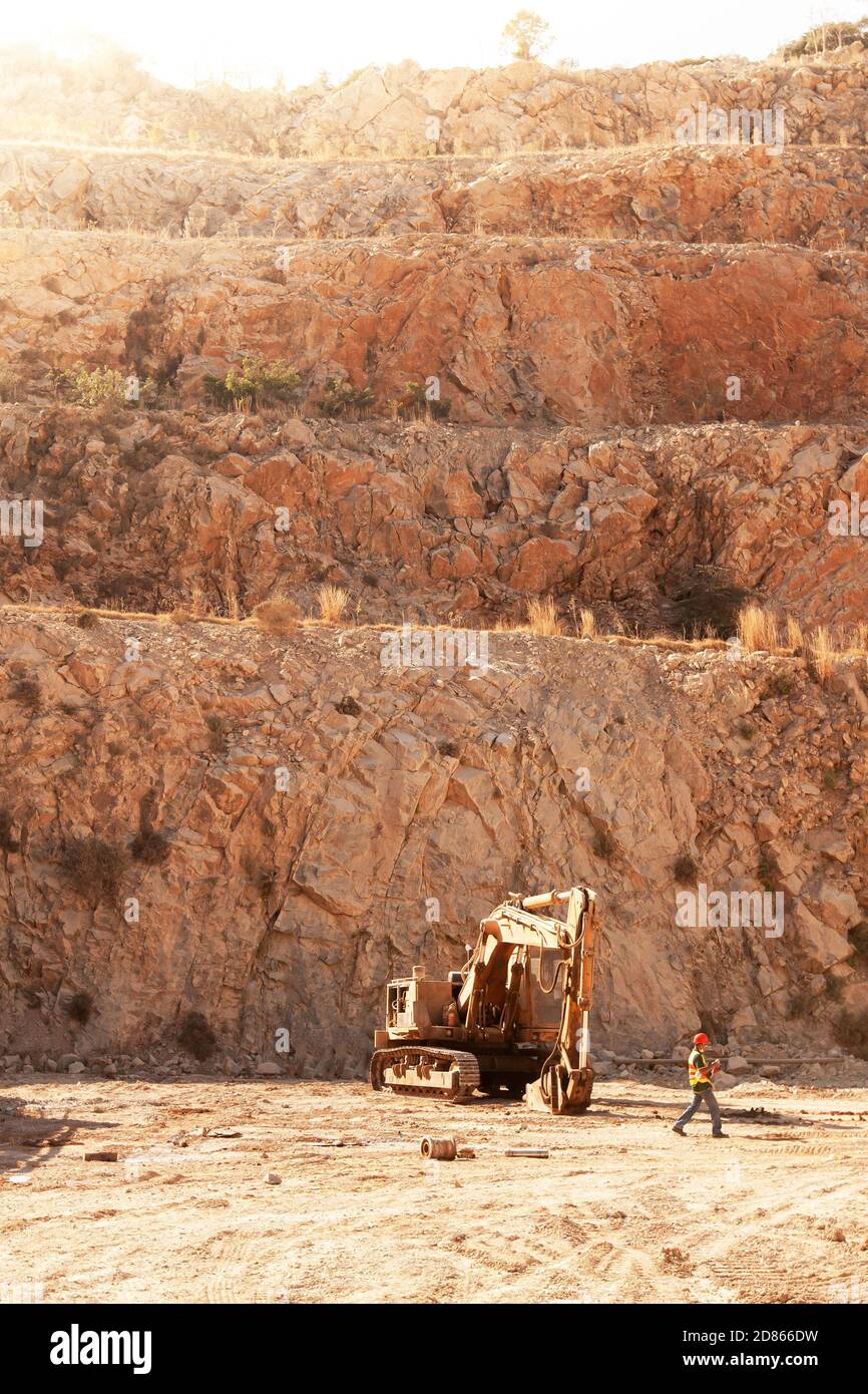 Miners working with mining tool in dusty and baking hot, mining and ...