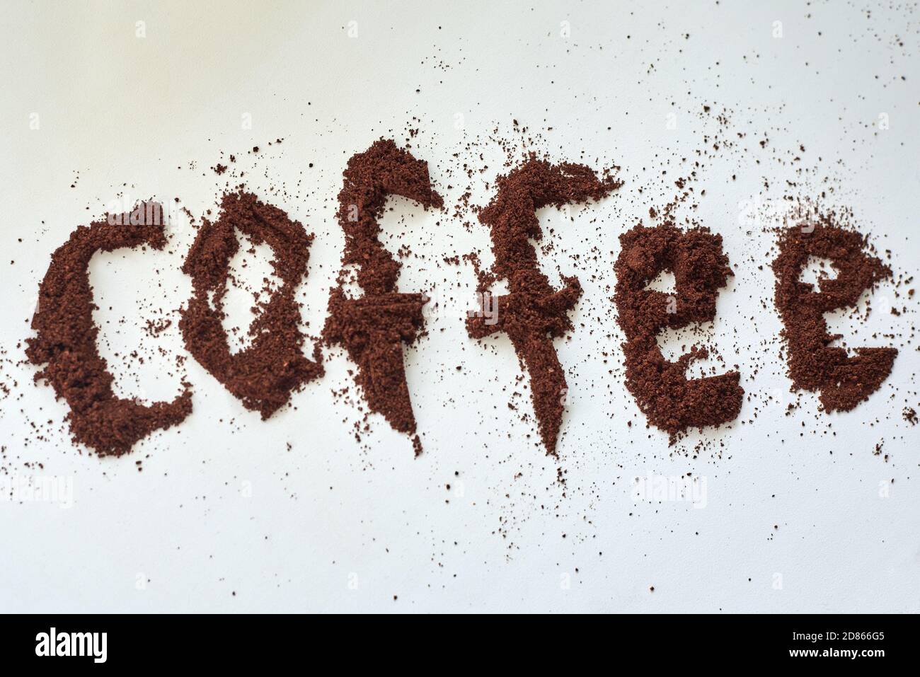 The word Coffee written from ground coffee on a white background Stock ...