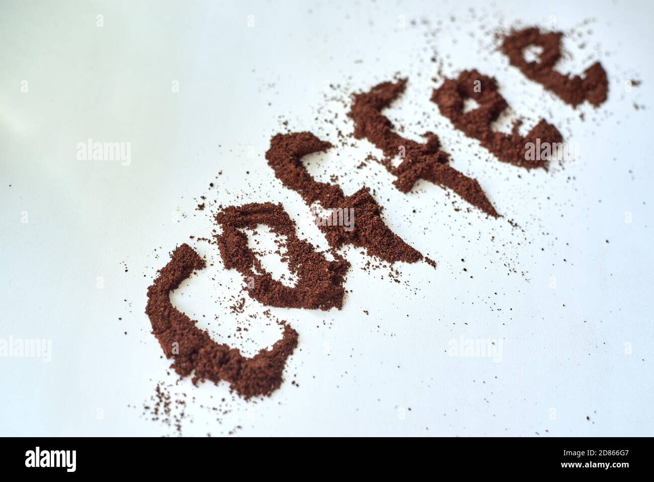 The word Coffee written from ground coffee on a white background Stock ...