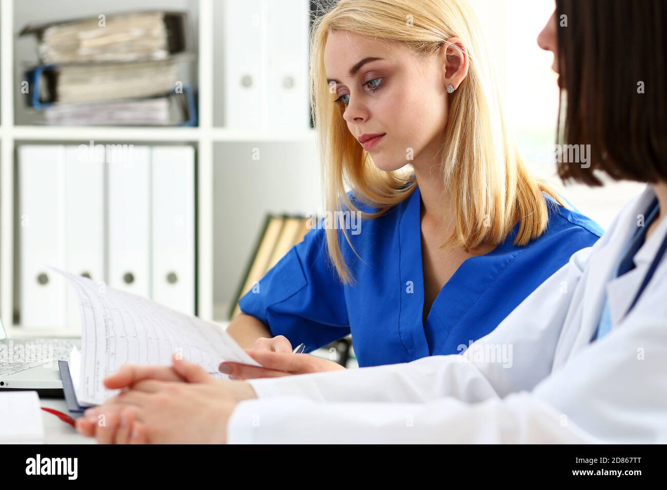 Group of doctors talking during conference portrait Stock Photo - Alamy