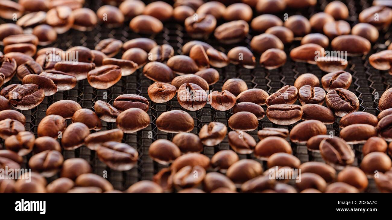 Broken coffee beans, background of roasting coffee beans Stock Photo ...