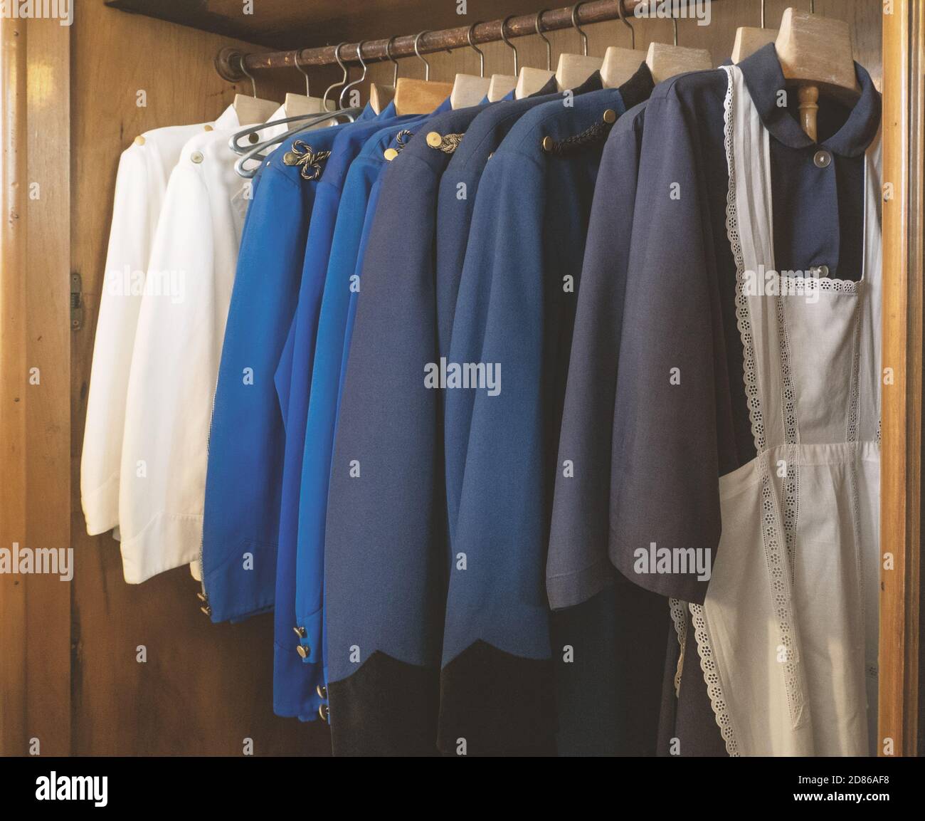 dressing room with hotel staff uniforms Stock Photo - Alamy
