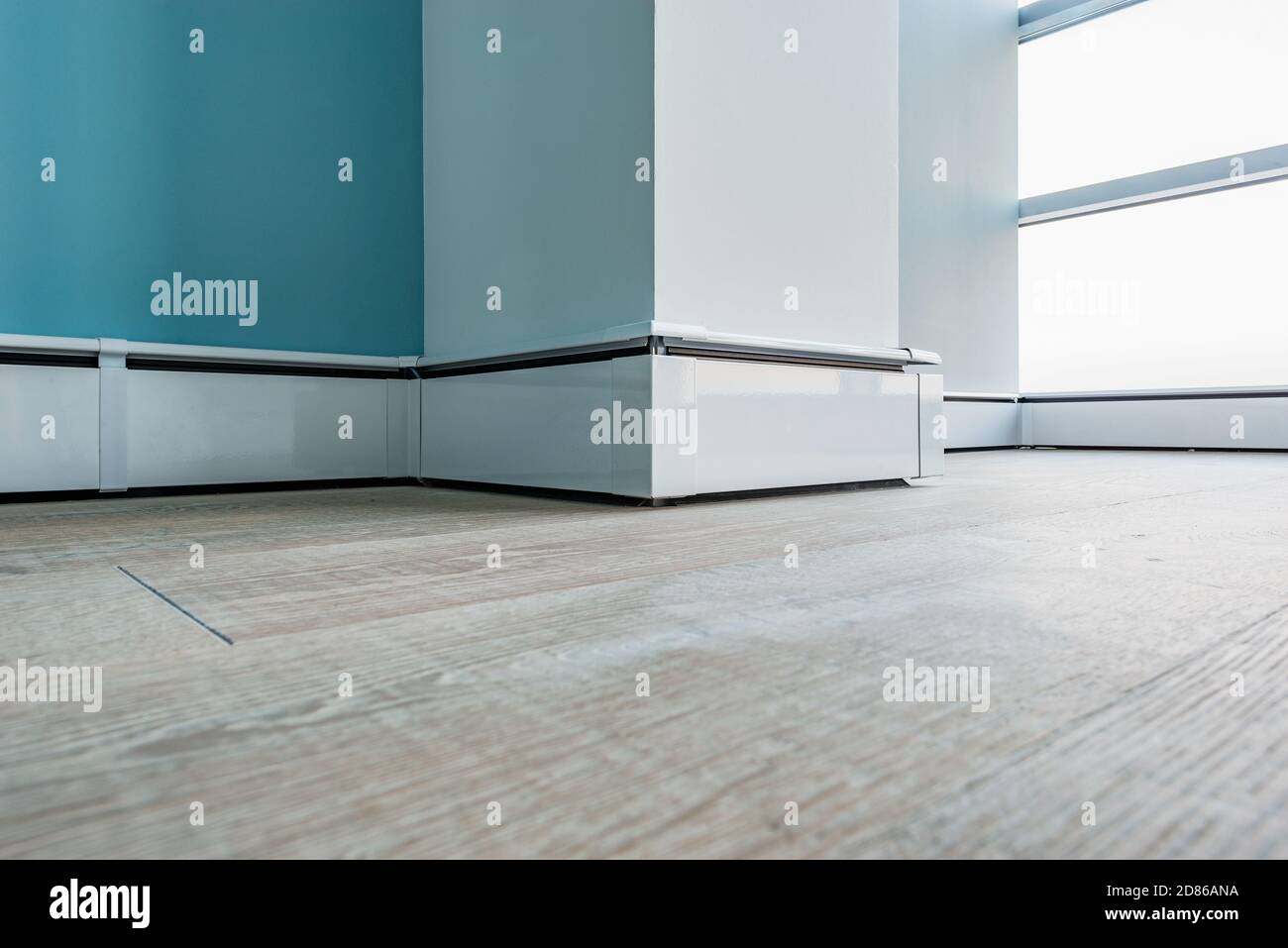 White plinth along the wall and floor Stock Photo - Alamy