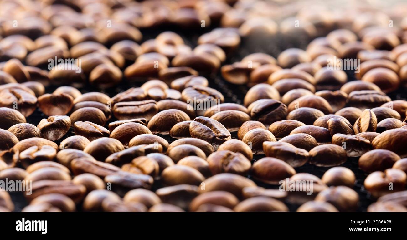 Broken coffee beans, background of roasting coffee beans Stock Photo ...