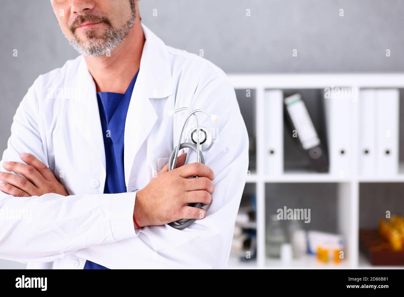 Male medicine doctor arms crossed on his chest in office Stock Photo ...