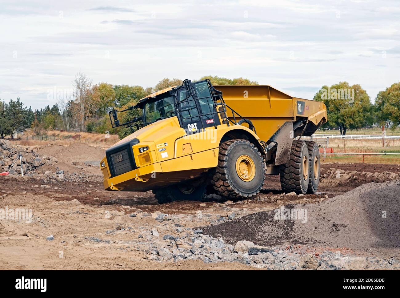 A large, earth moving dump truck on a construction site in Bend, Oregon ...