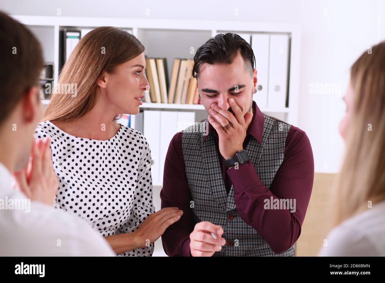 Woman gossip whispers in the ear of news to a man Stock Photo - Alamy