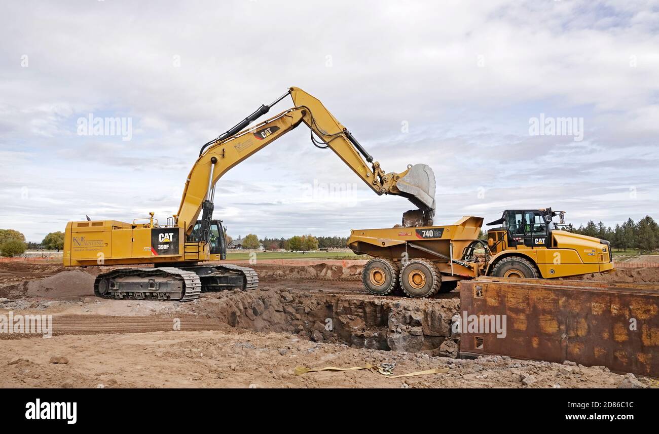 A large, earth moving tractor on a construction site in Bend, Oregon ...