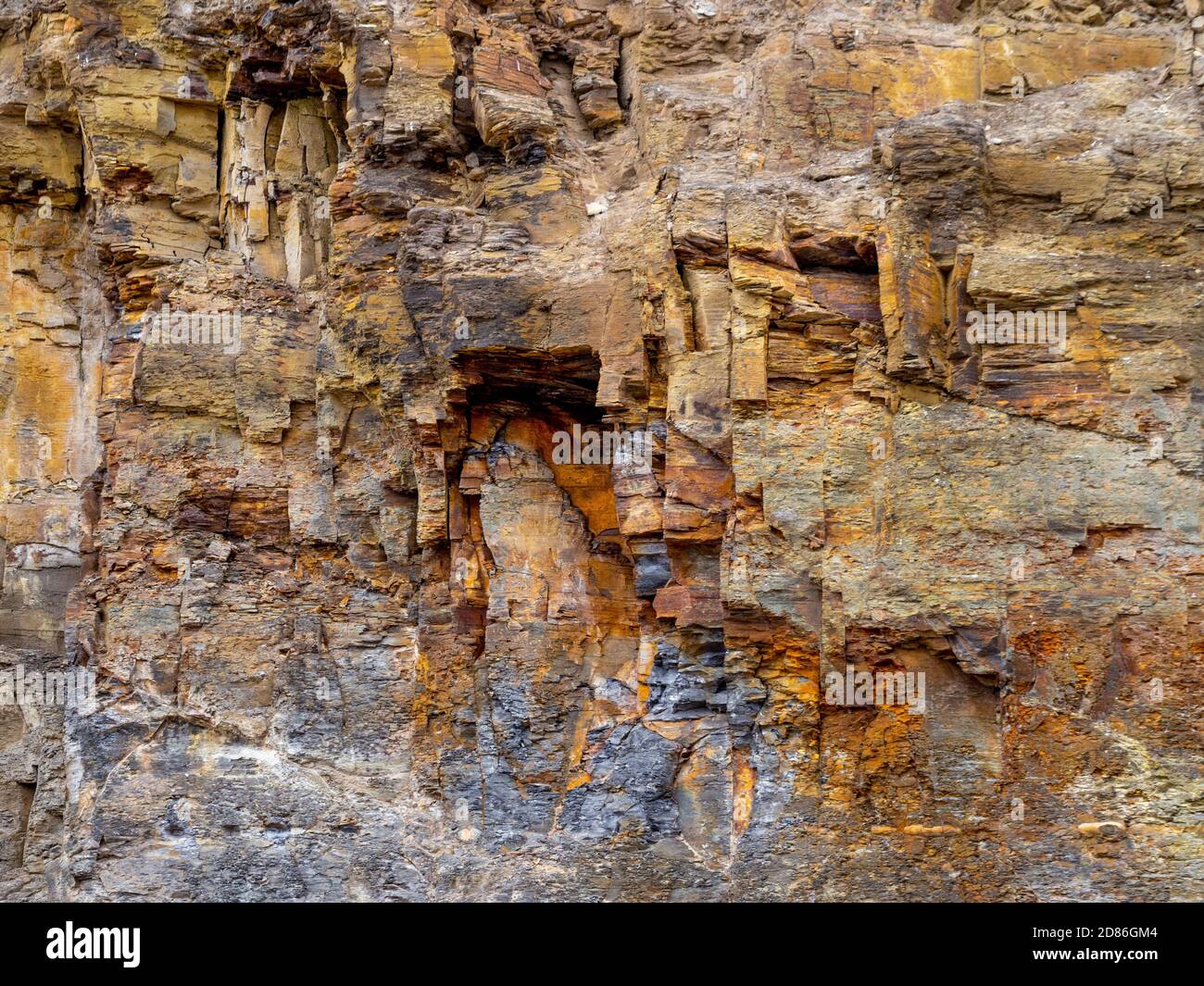Red Ironstone and Grey shale rock in cliff at Runswick Bay, North ...