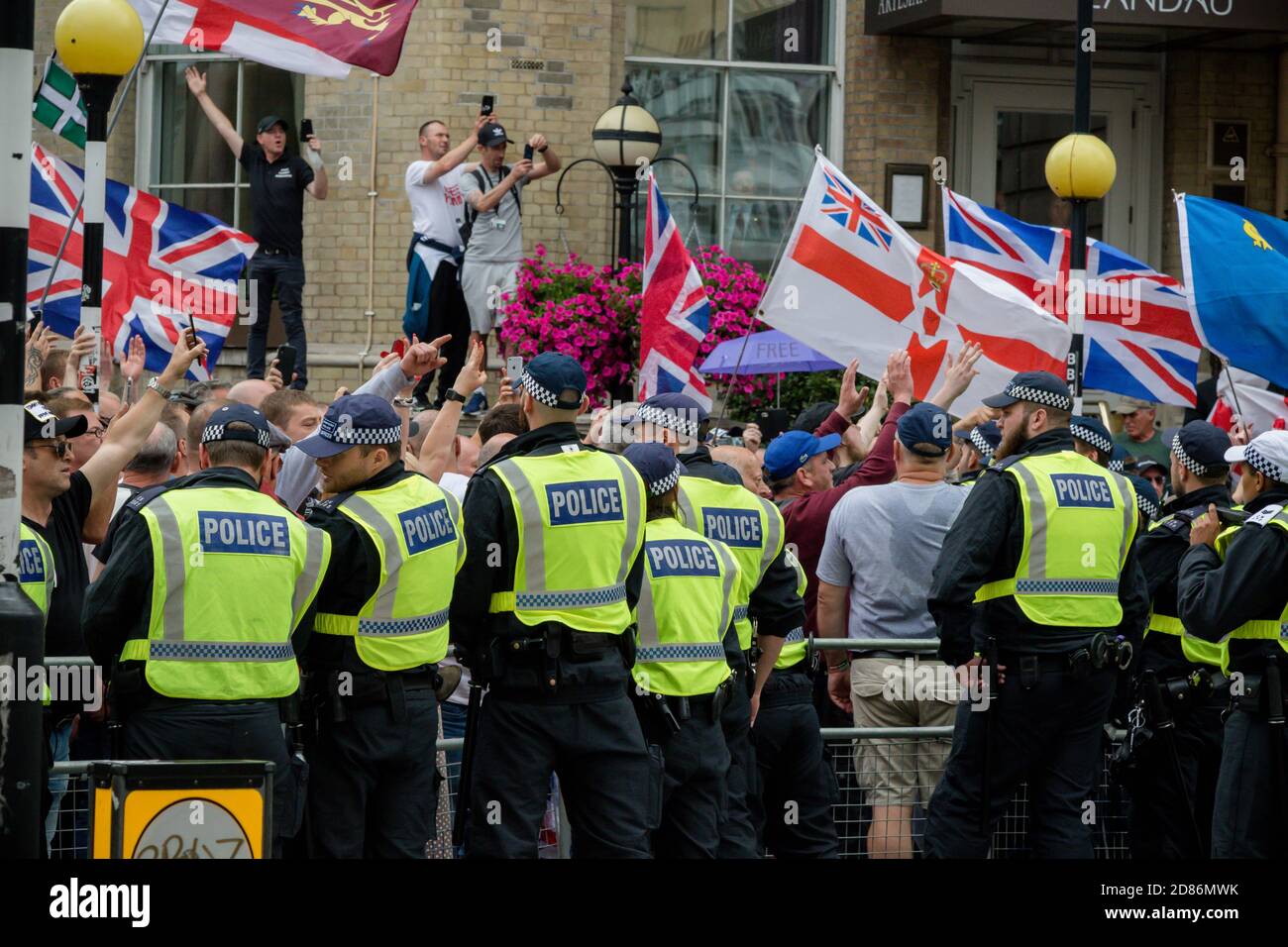 London, United Kingdom, August 3rd 2019:- Police form a line to control ...