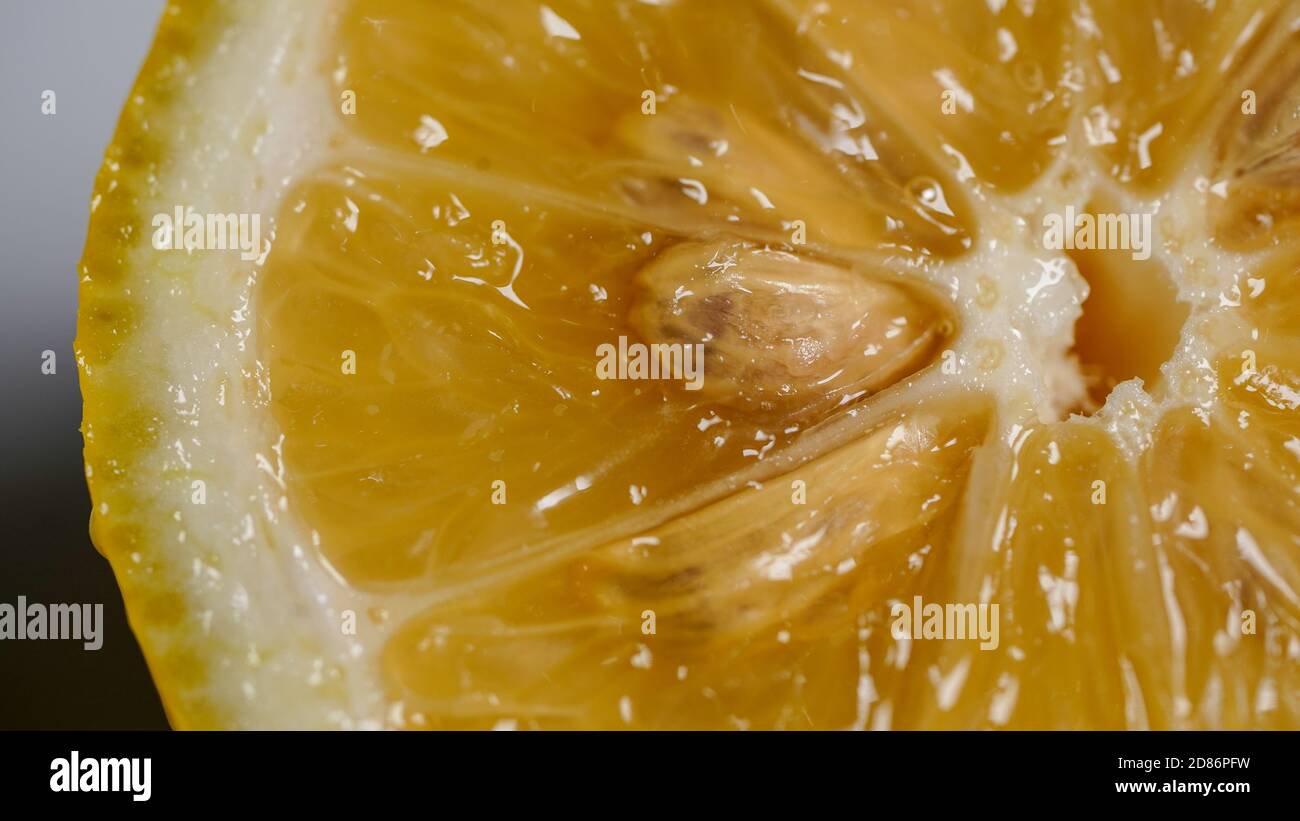 Lemon slice cut juice seed inside Stock Photo - Alamy