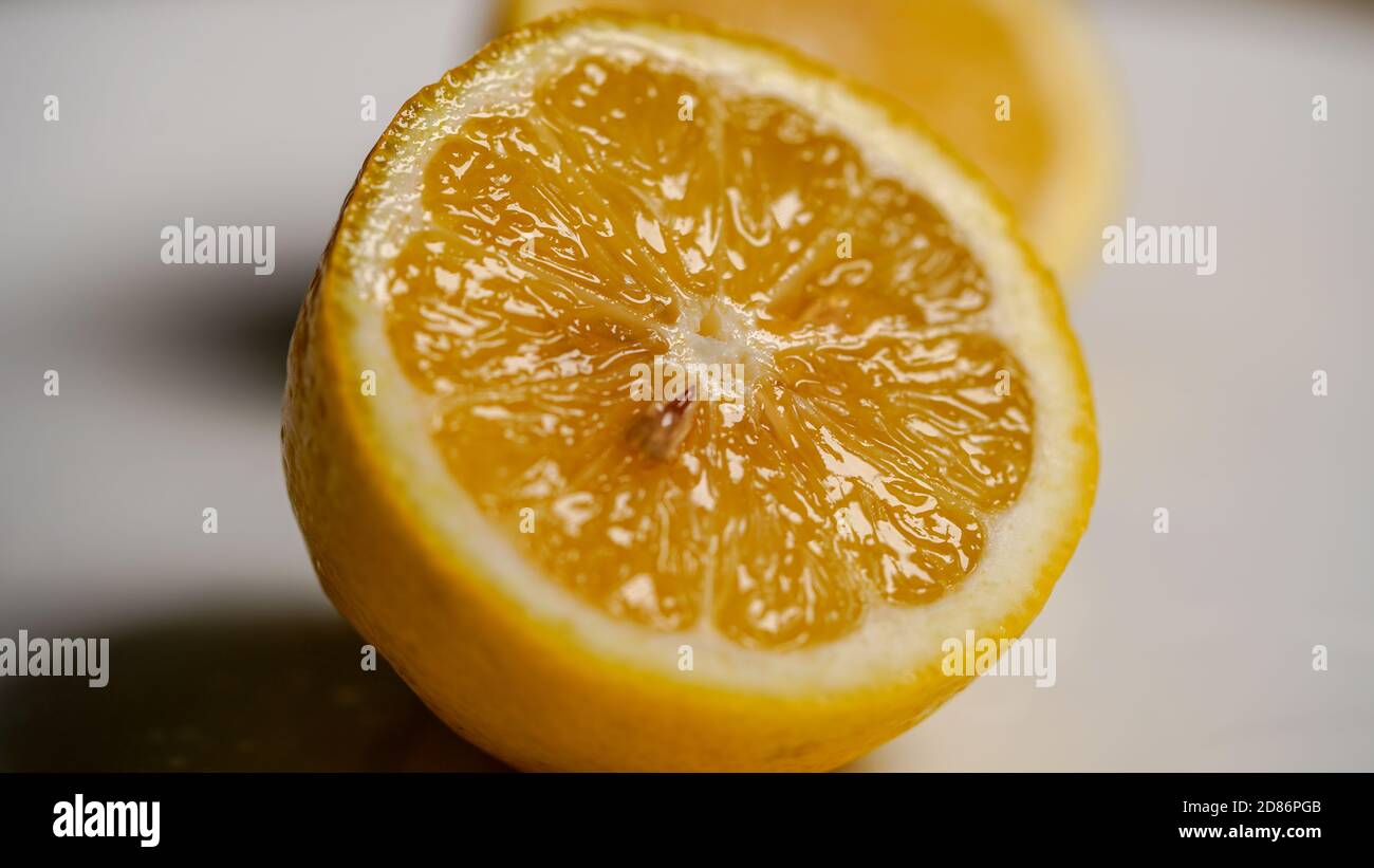 Lemon slice cut juice seed inside Stock Photo - Alamy