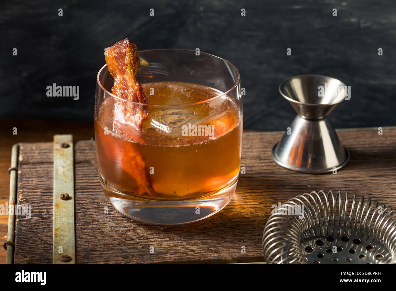 Boozy Maple Bacon Old Fashioned Cocktail with Bourbon Stock Photo - Alamy