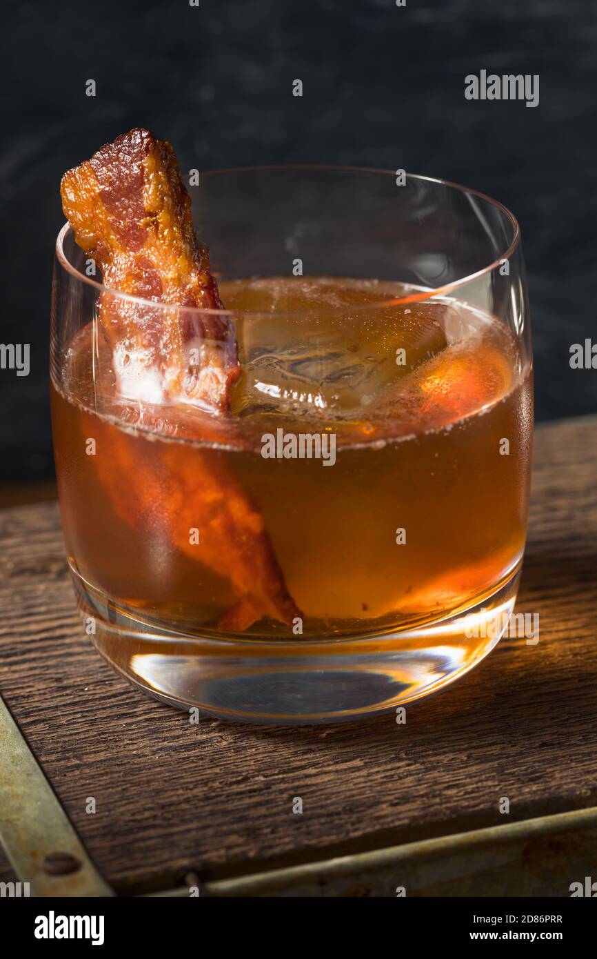 Boozy Maple Bacon Old Fashioned Cocktail with Bourbon Stock Photo - Alamy