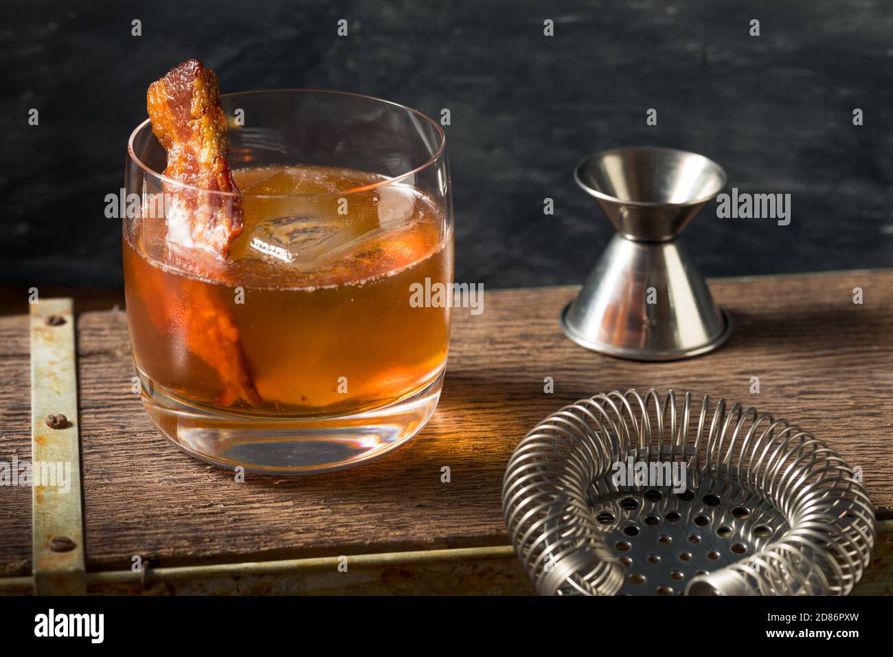 Boozy Maple Bacon Old Fashioned Cocktail with Bourbon Stock Photo - Alamy