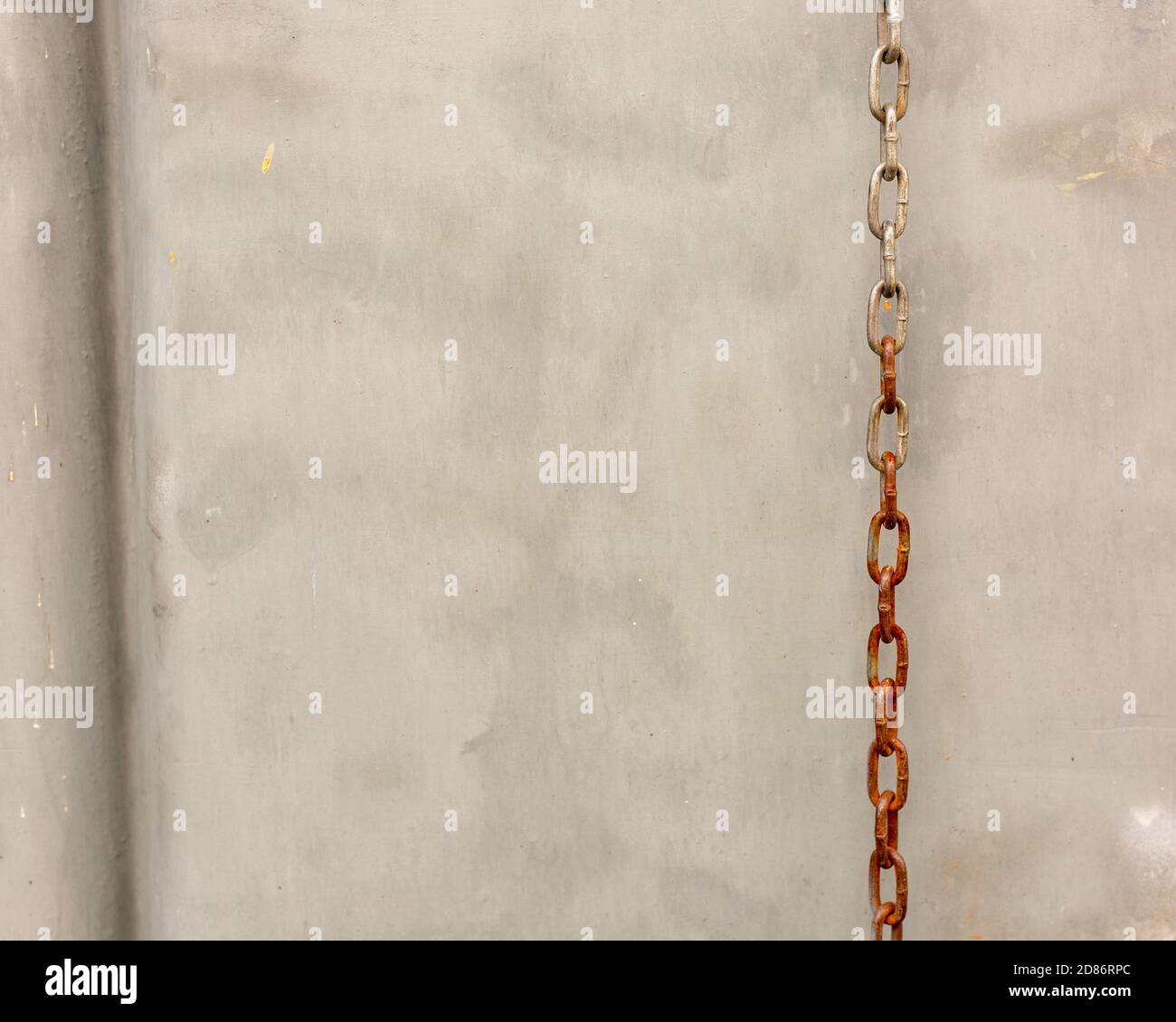 Iron chain in a wall Stock Photo - Alamy