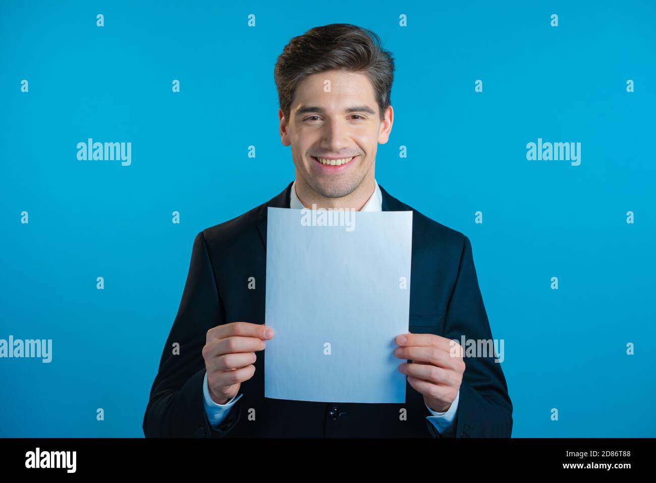 Person holding a4 paper hi-res stock photography and images - Alamy