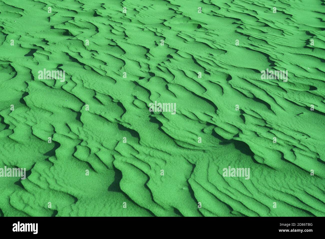 Pop art surreal style shamrock green colored unique desert sand ripple ...
