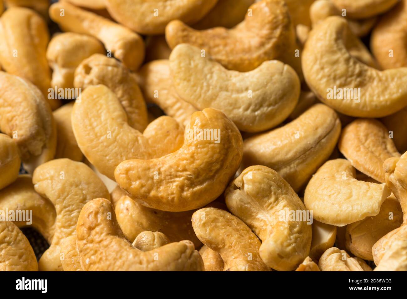 Raw Organic Shelled Cashew Nuts in a Bowl Stock Photo - Alamy