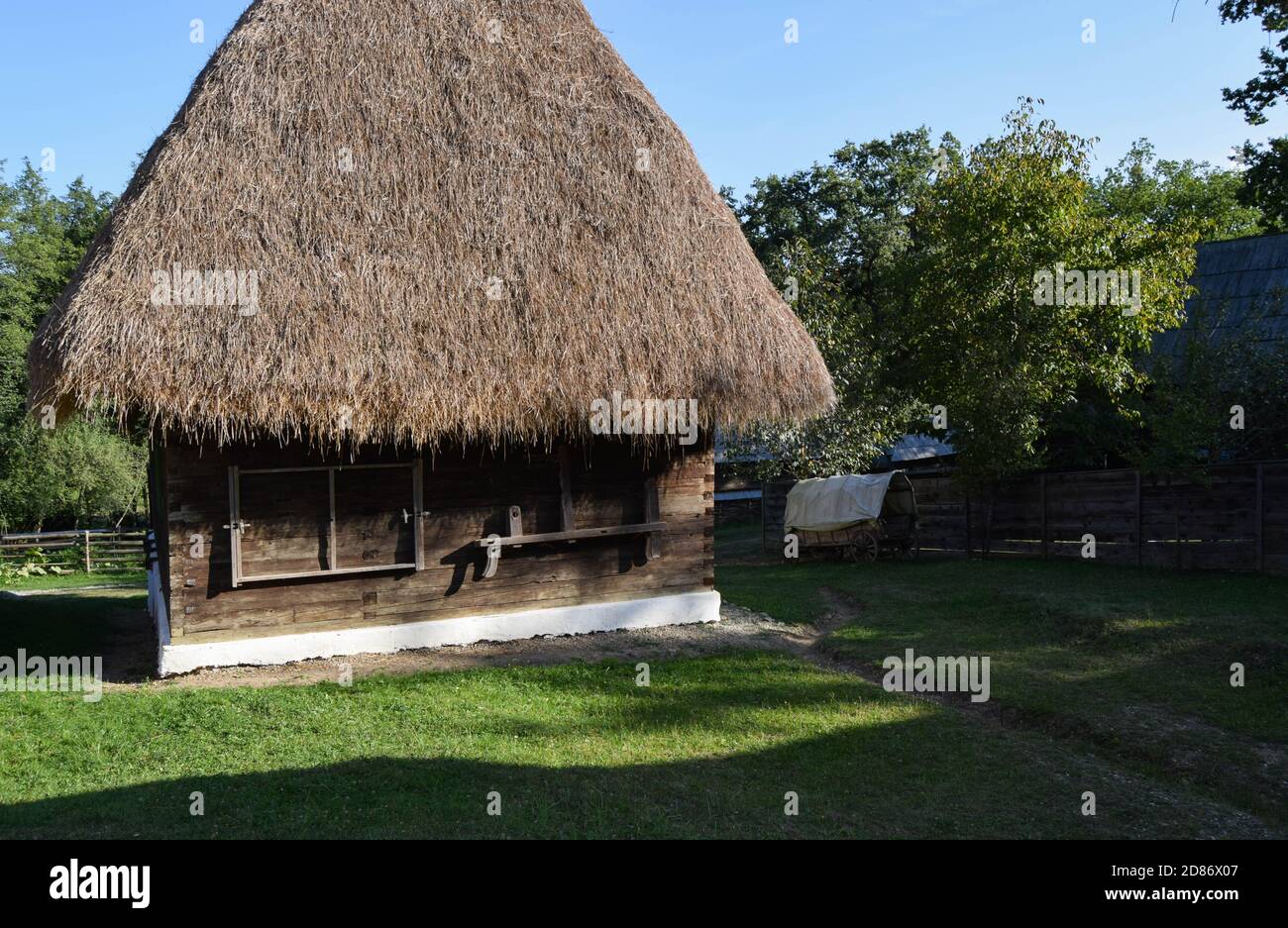 Traditional Romanian rural house with wooden walls, small windows ...