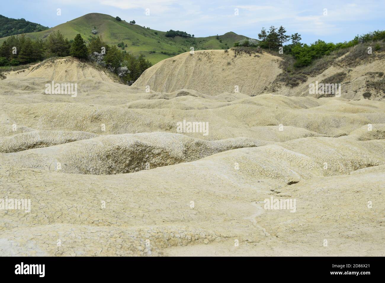 Landscape with cracked soil from Mud Volcanoes, at Paclele Mari ...