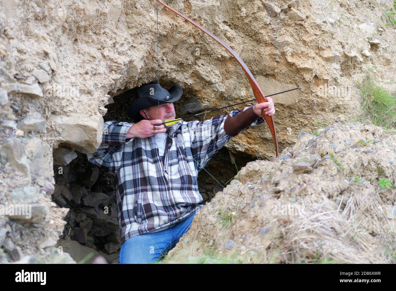 Archer with bow Stock Photo - Alamy