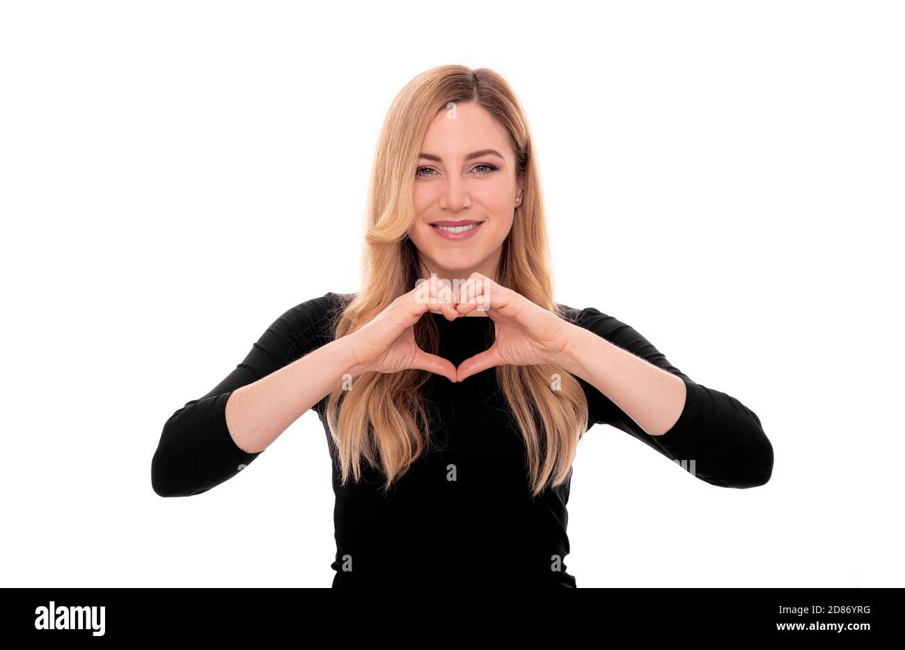 Woman shows heart sign with her hands. On white background Stock Photo ...
