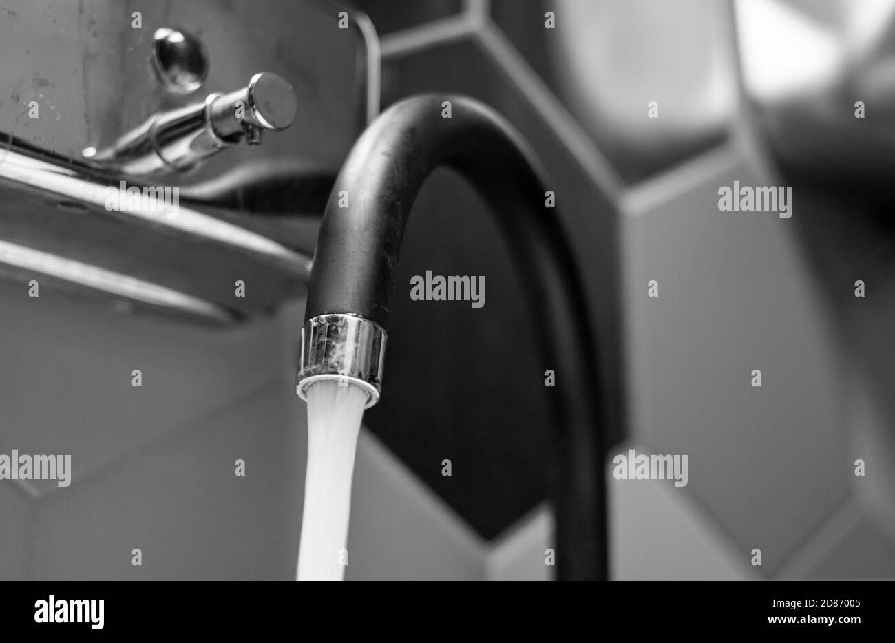 Steel water tap Black and White Stock Photos & Images - Alamy