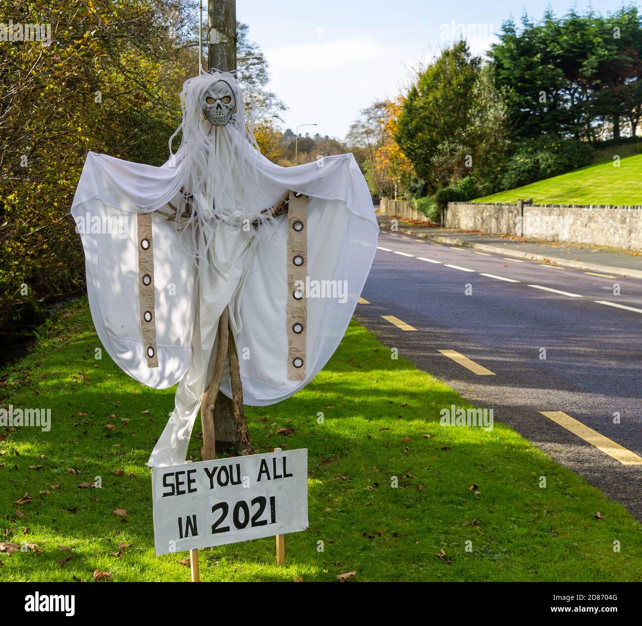 Halloween Ghost figure with farewell until 2021 sign Stock Photo - Alamy