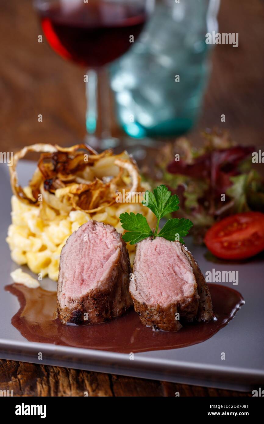 pork filet with swabian pasta Stock Photo - Alamy