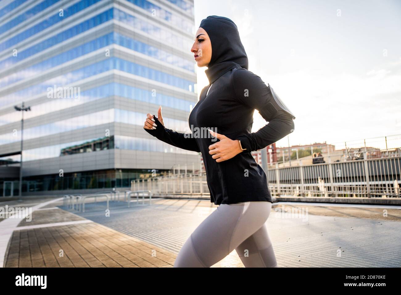 Muslim sportive girl with fit body training outside - Beautiful woman ...