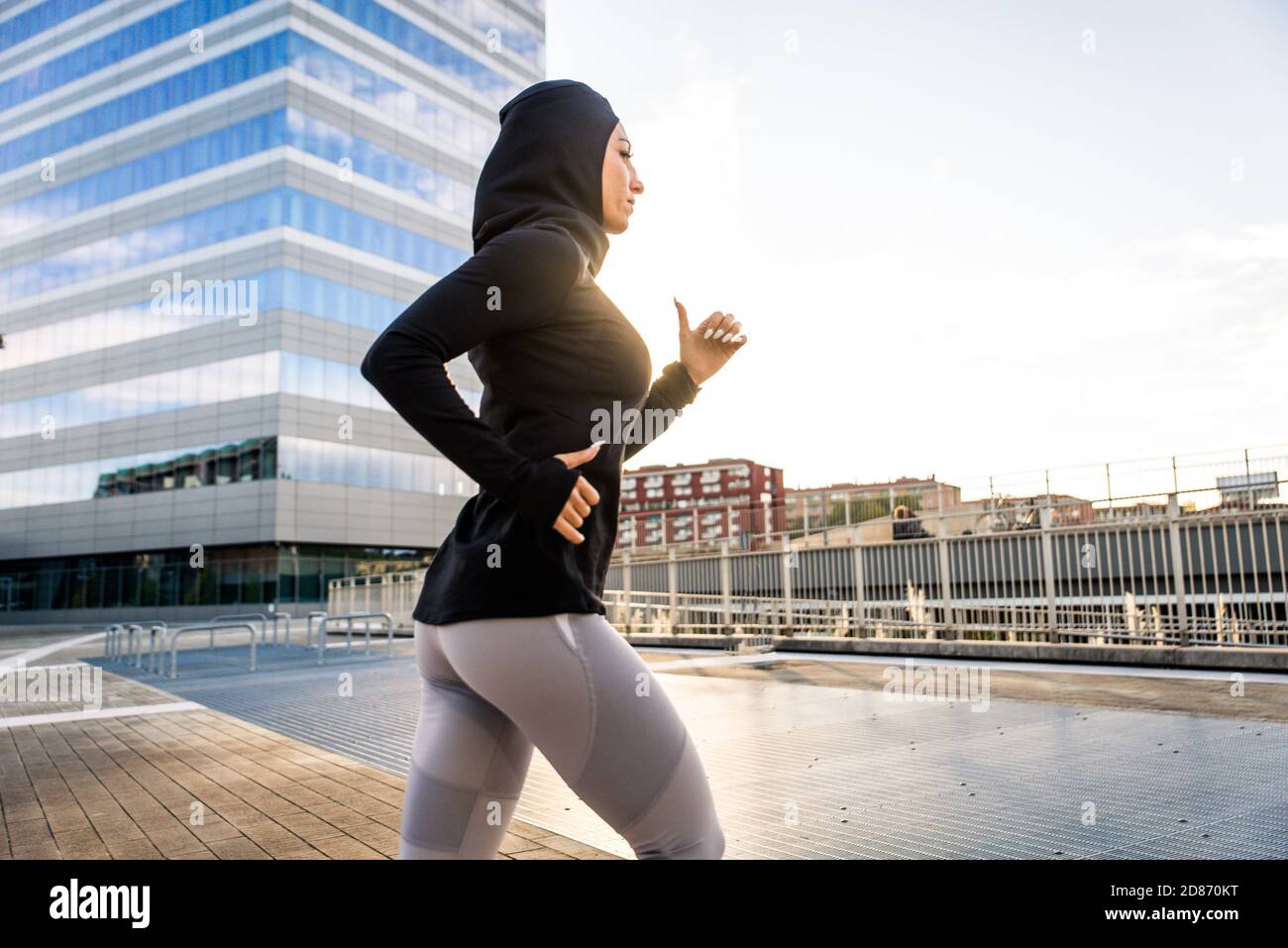 Muslim sportive girl with fit body training outside - Beautiful woman ...