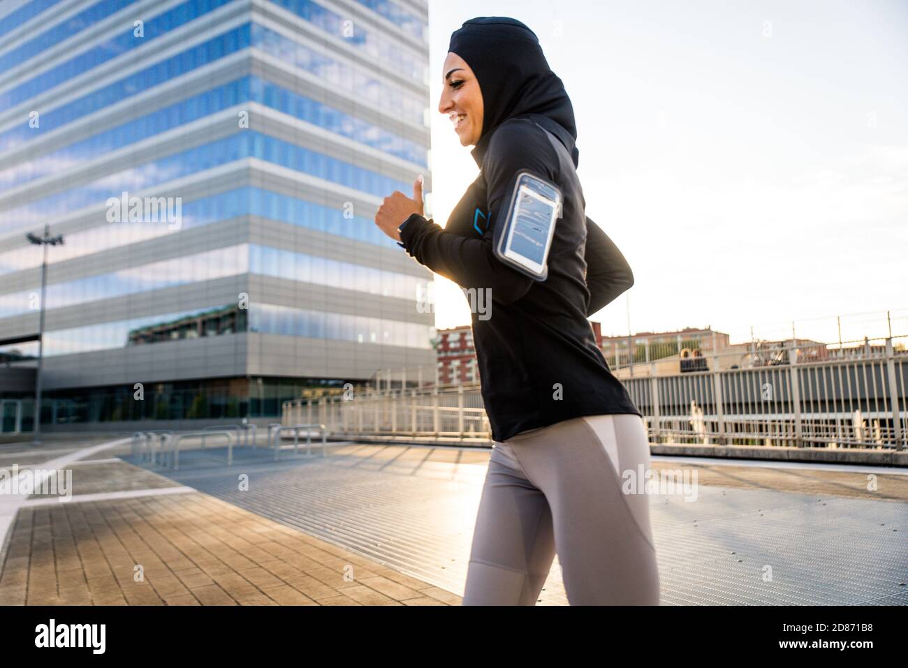 Muslim sportive girl with fit body training outside - Beautiful woman ...