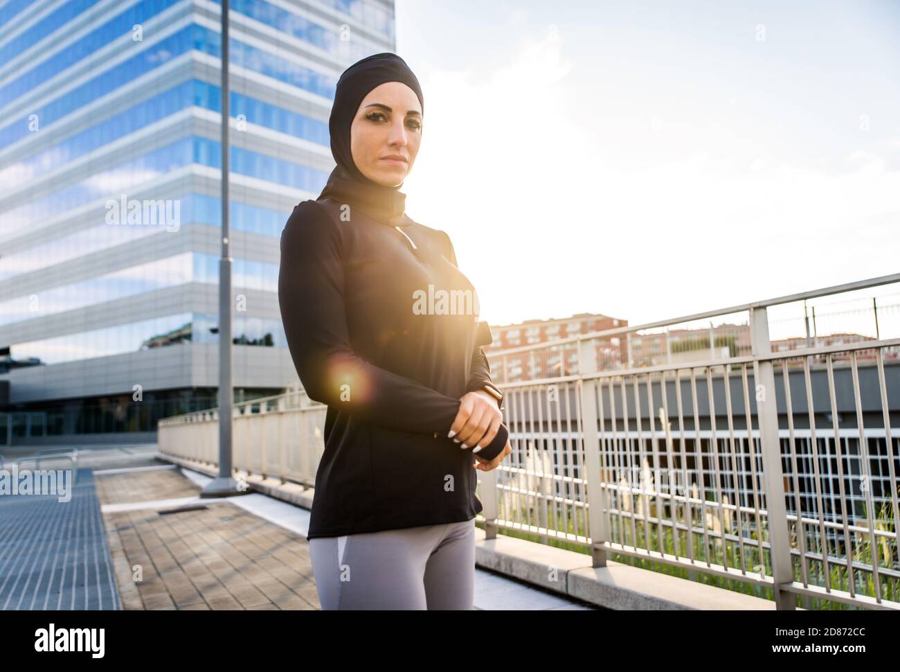 Muslim sportive girl with fit body training outside - Beautiful woman ...