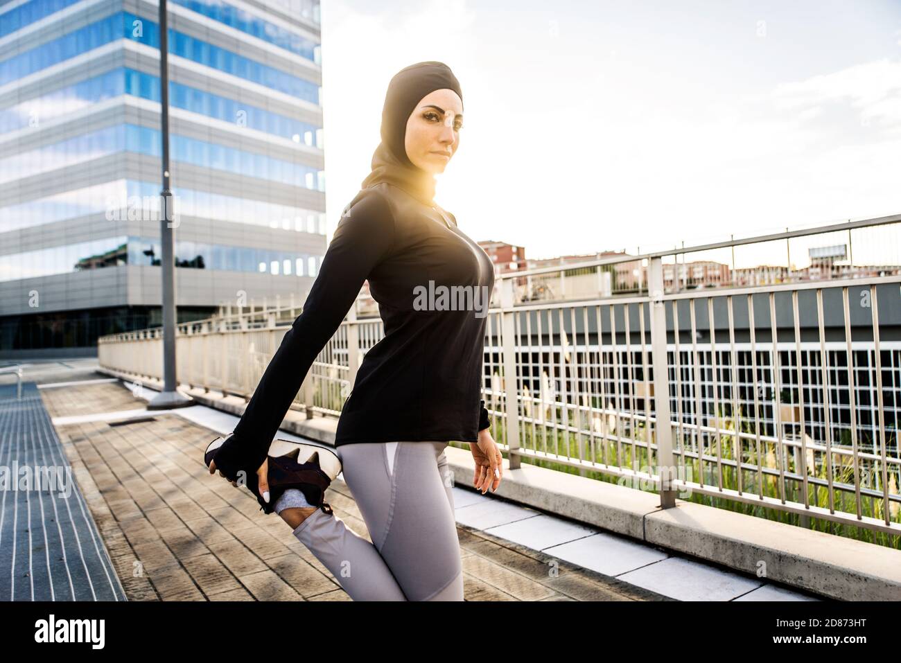 Muslim sportive girl with fit body training outside - Beautiful woman ...