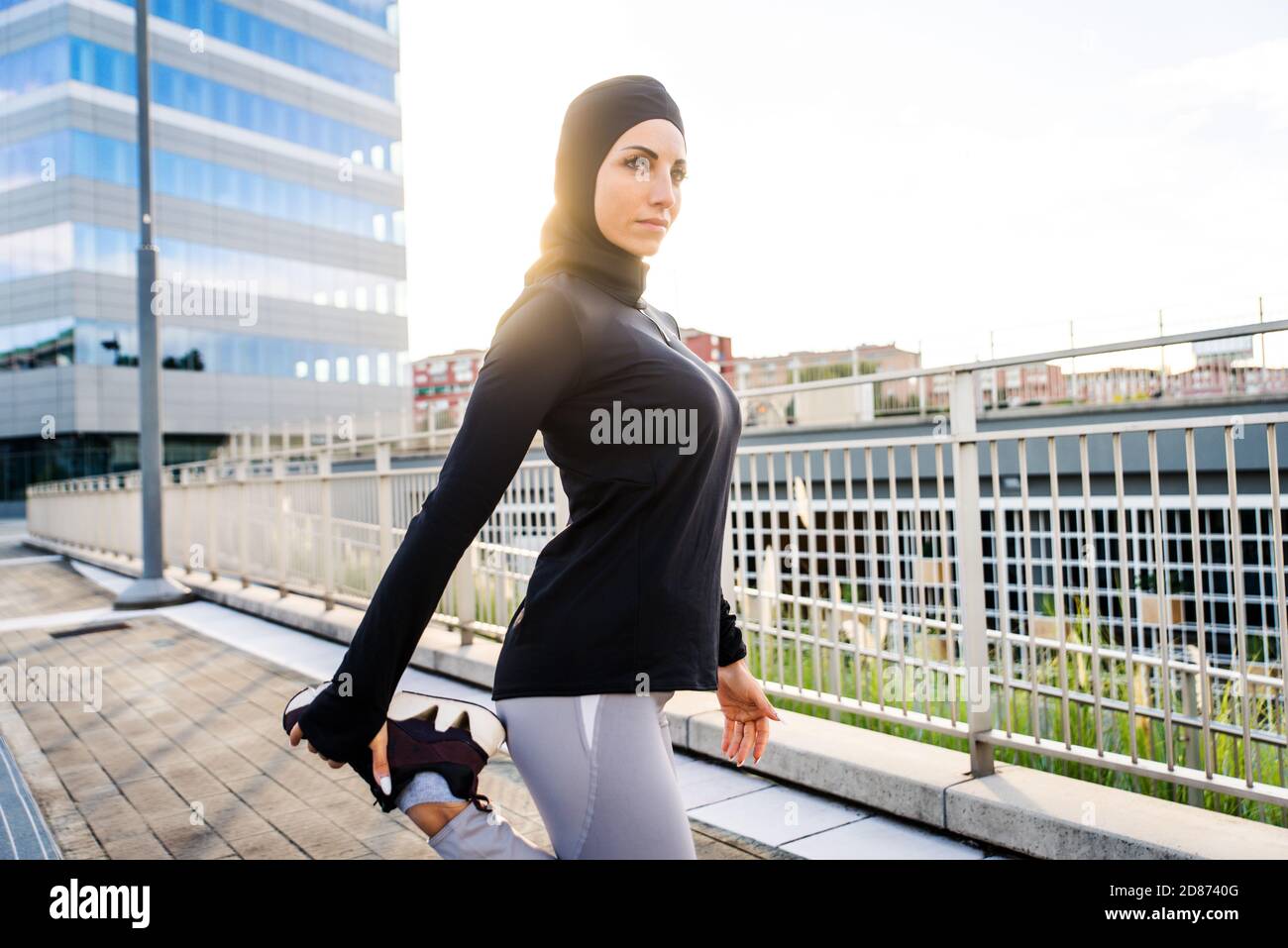 Muslim sportive girl with fit body training outside - Beautiful woman ...