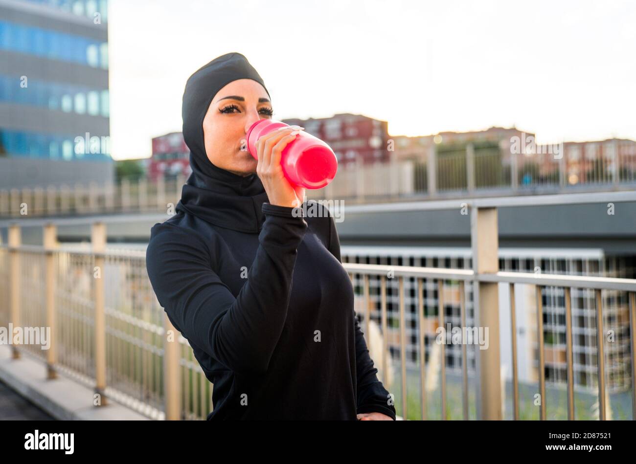 Muslim sportive girl with fit body training outside - Beautiful woman ...