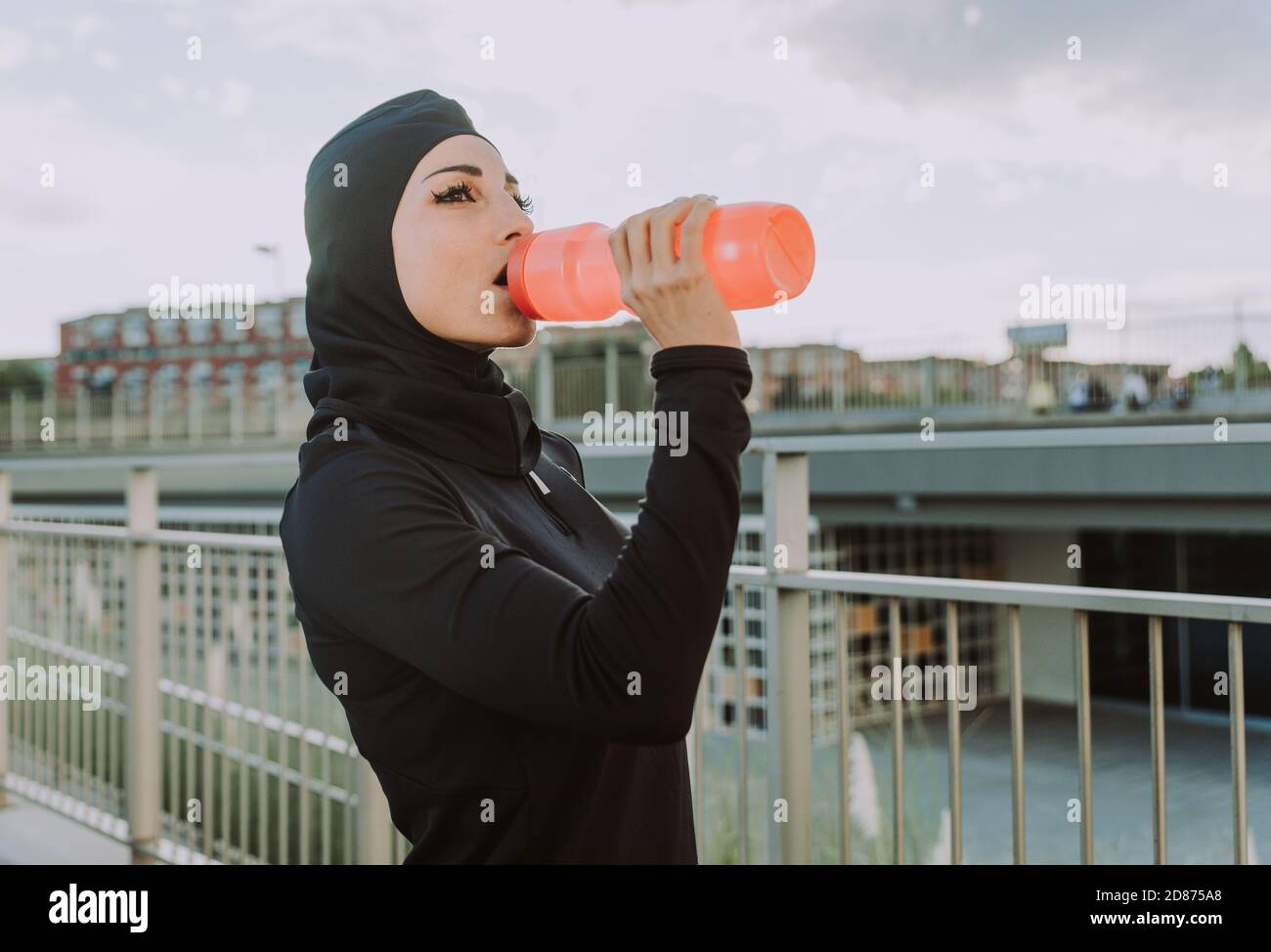 Muslim sportive girl with fit body training outside - Beautiful woman ...