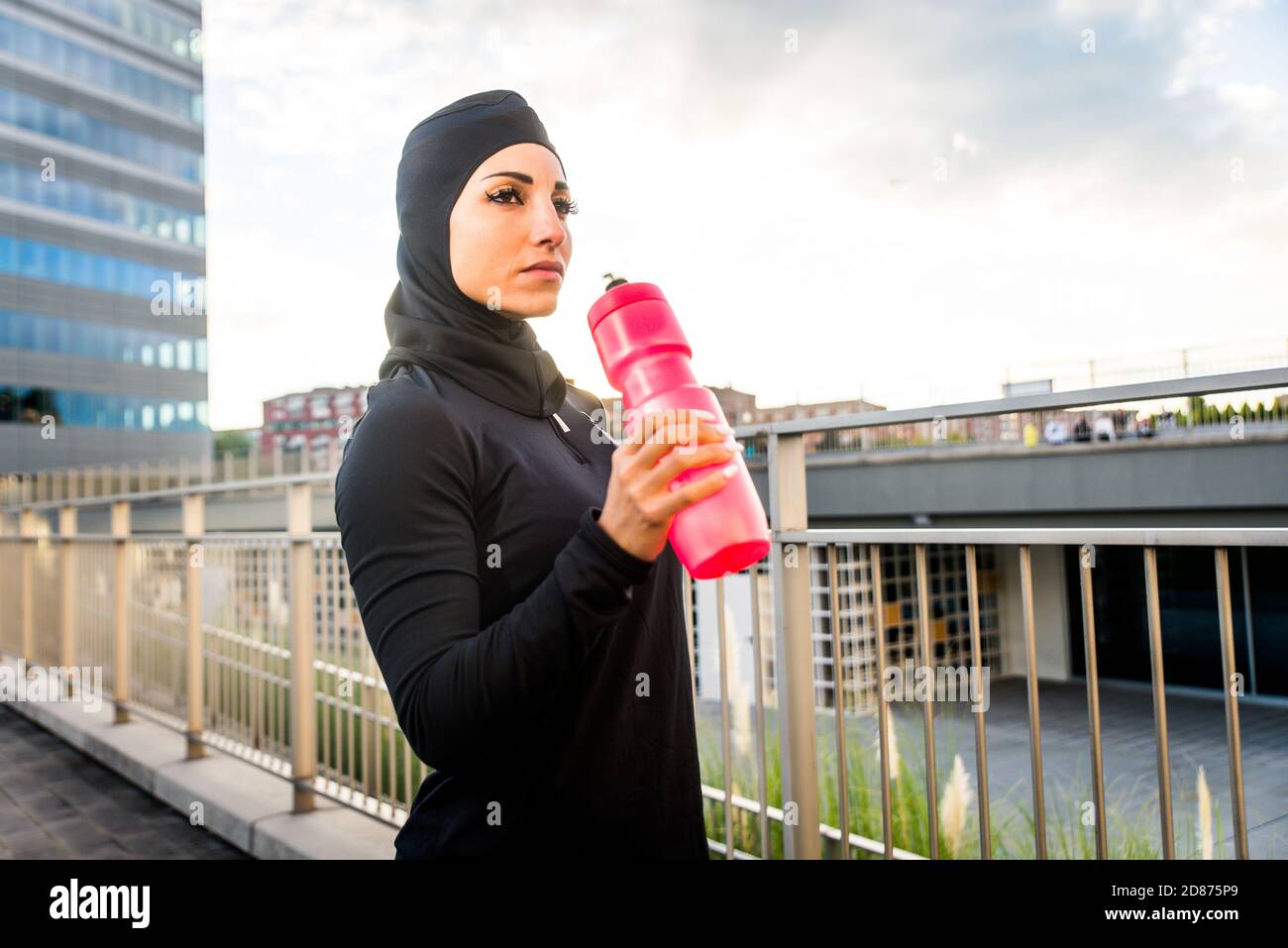 Muslim sportive girl with fit body training outside - Beautiful woman ...