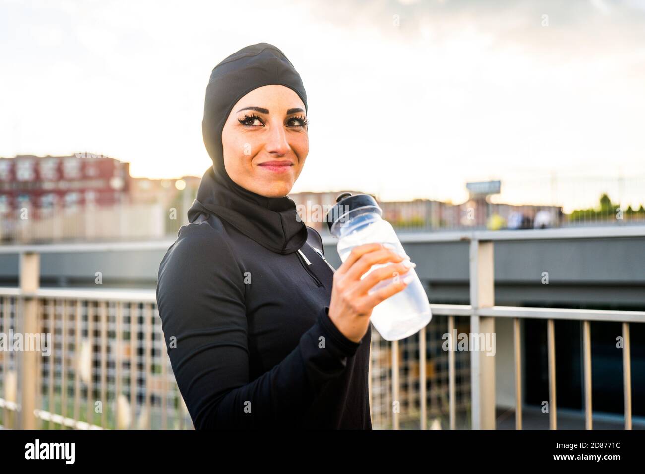 Muslim sportive girl with fit body training outside - Beautiful woman ...